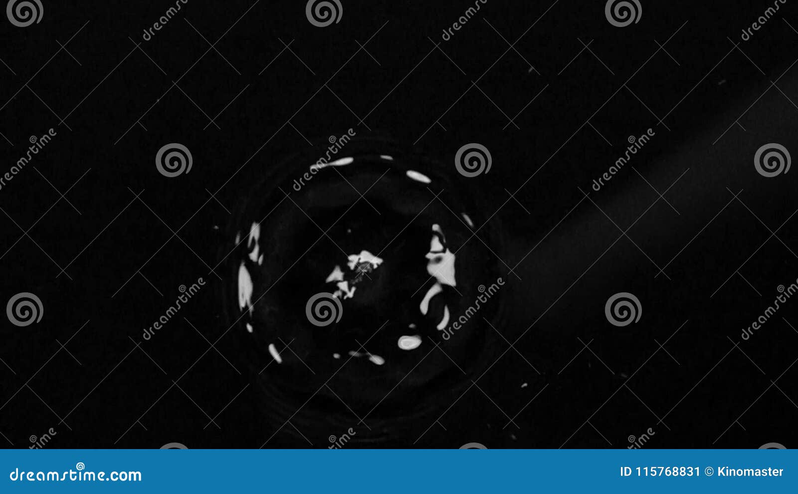 Falling Drop Forms Circles on the Water Surface. Black Background. Slow ...