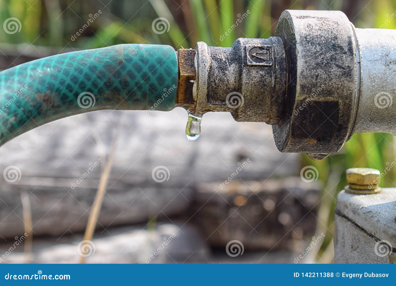 Falling Drop from Metal Pipe with Water Close-up Stock Photo - Image of ...