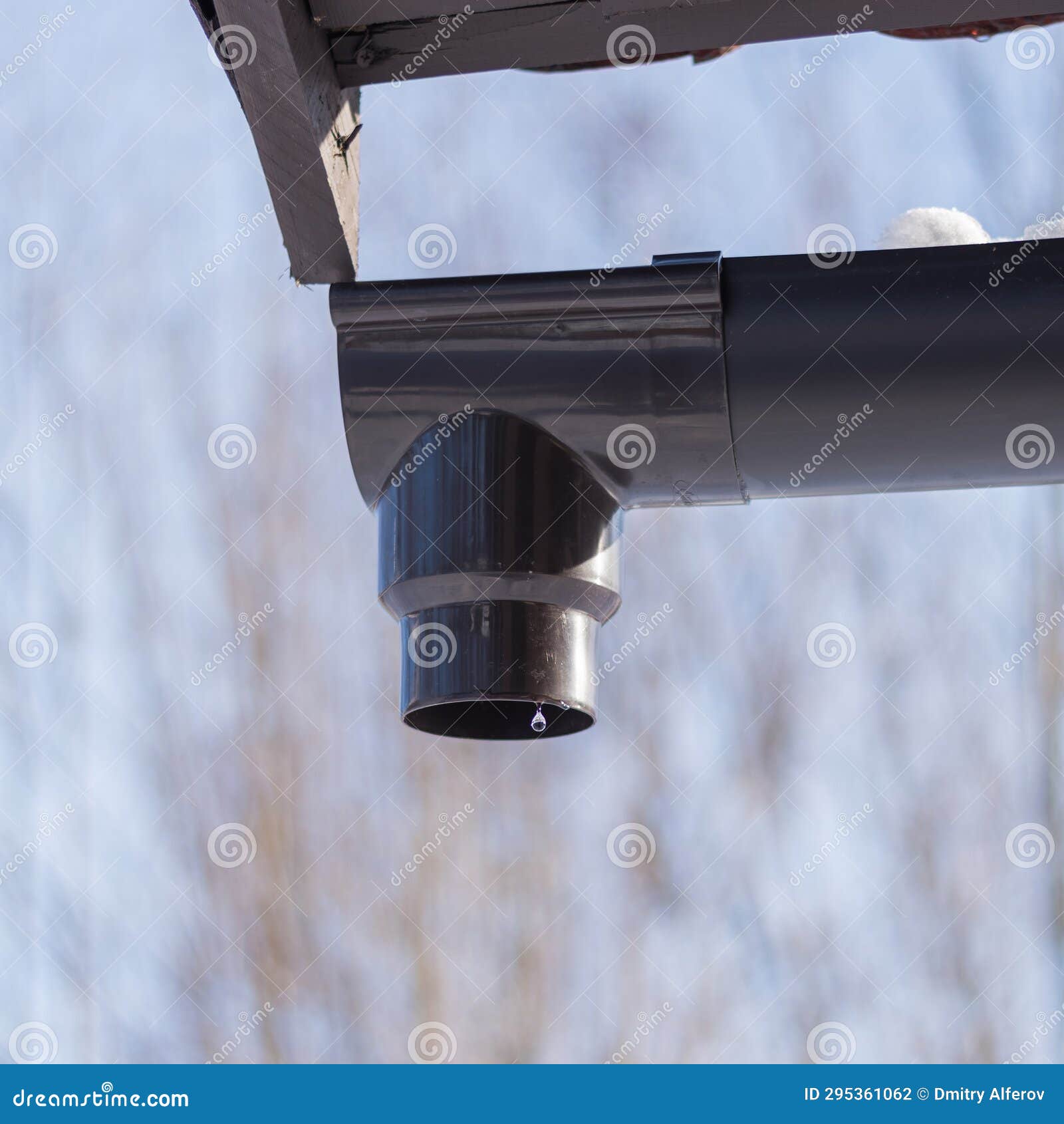 Falling Drops from Melting Snow from the Roof through the Gutters ...