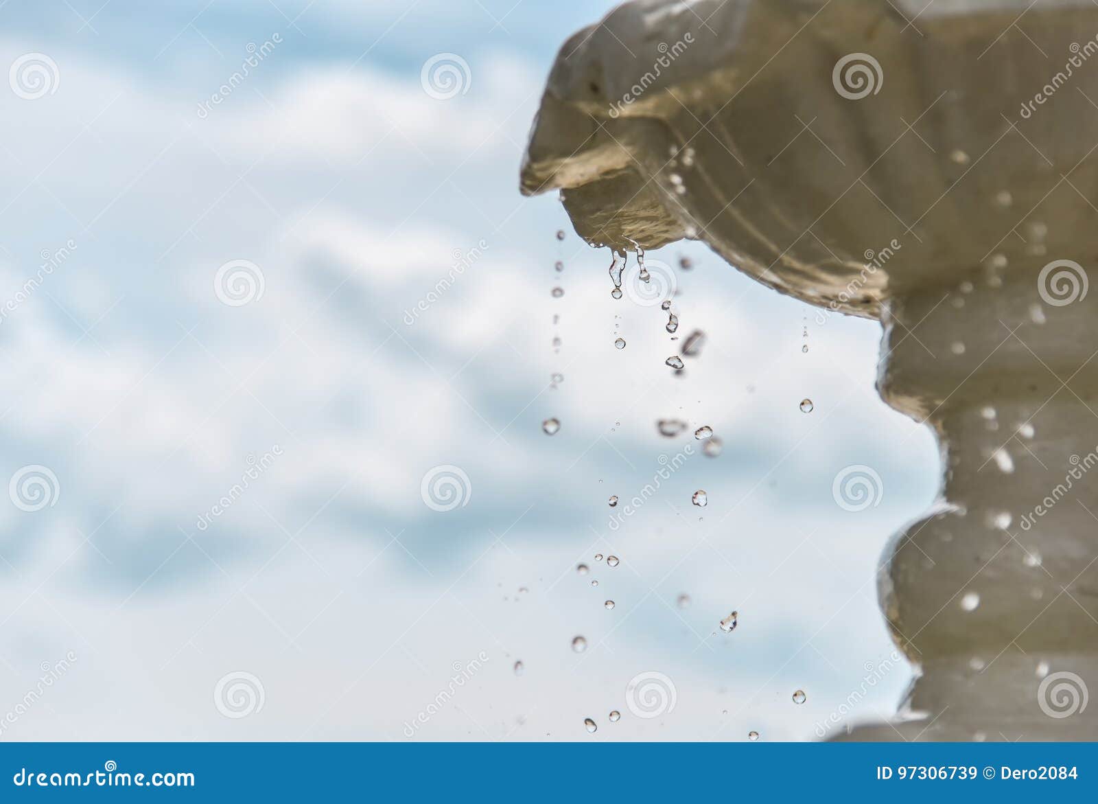 Falling Drops of Water in the Fountain, Freezing, Blue Sky in the ...