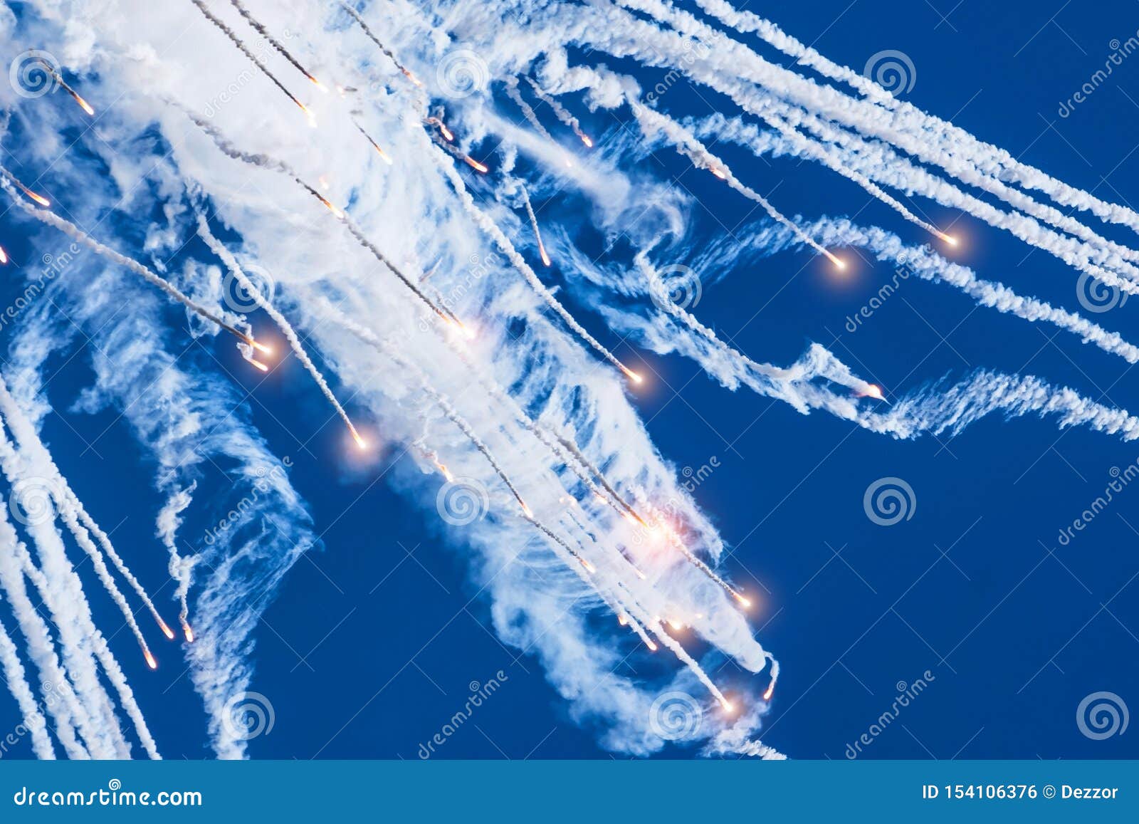 Falling Exploding Shells with Fire and White Smoke in the Sky Stock ...