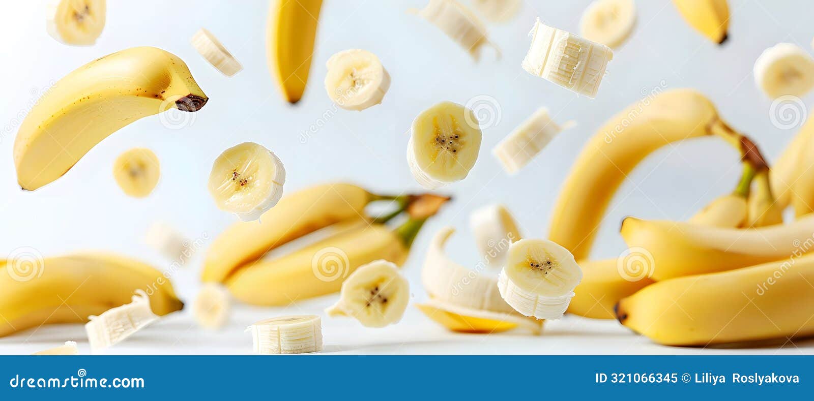 Falling Flying Bananas on a White Background. Selective Focusing. Stock ...