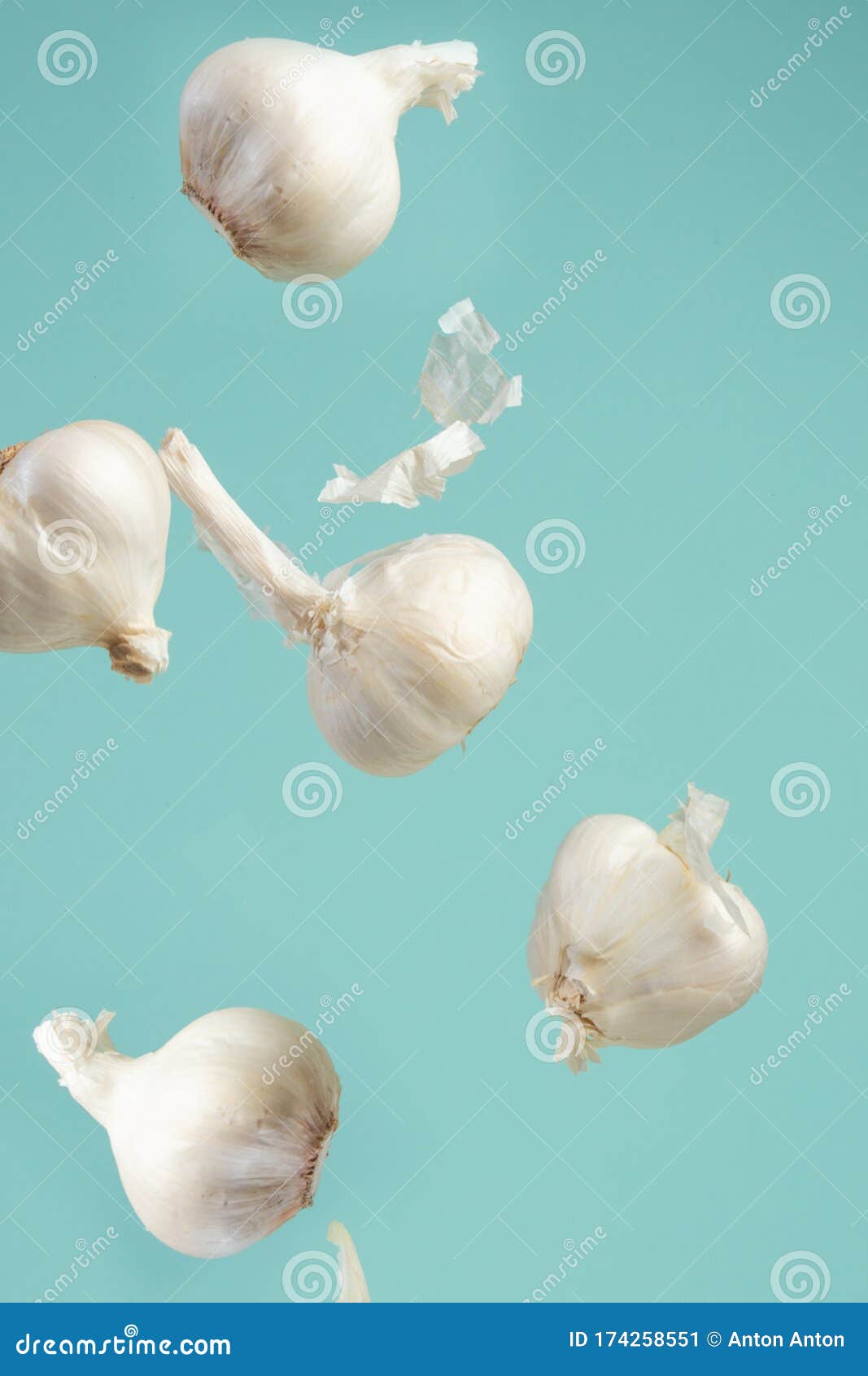Falling Garlic, on a Light Background. Isolate for Design, Freeze in ...