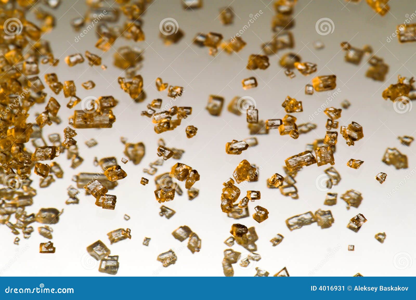 Falling gold crystals stock image. Image of emerald, macro - 4016931