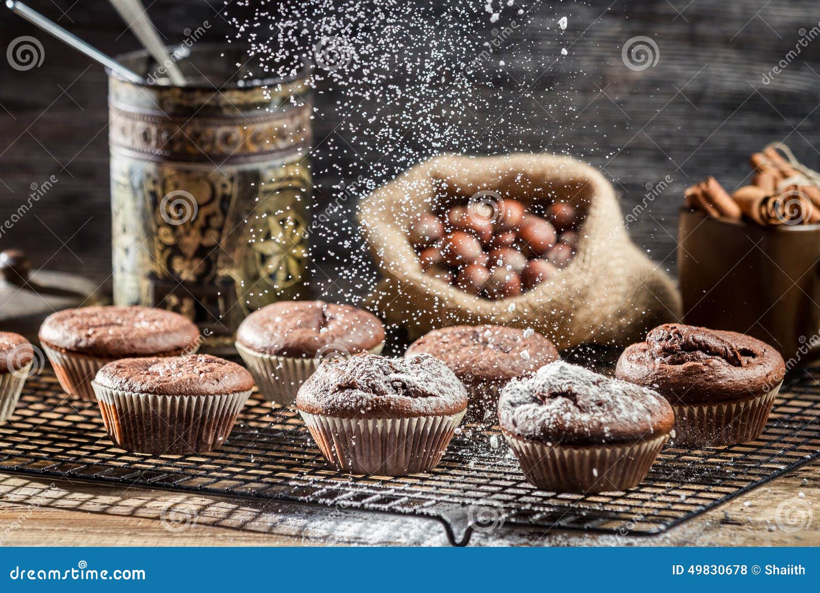 Falling Icing Sugar on Fresh Chocolate Muffins Stock Photo - Image of ...