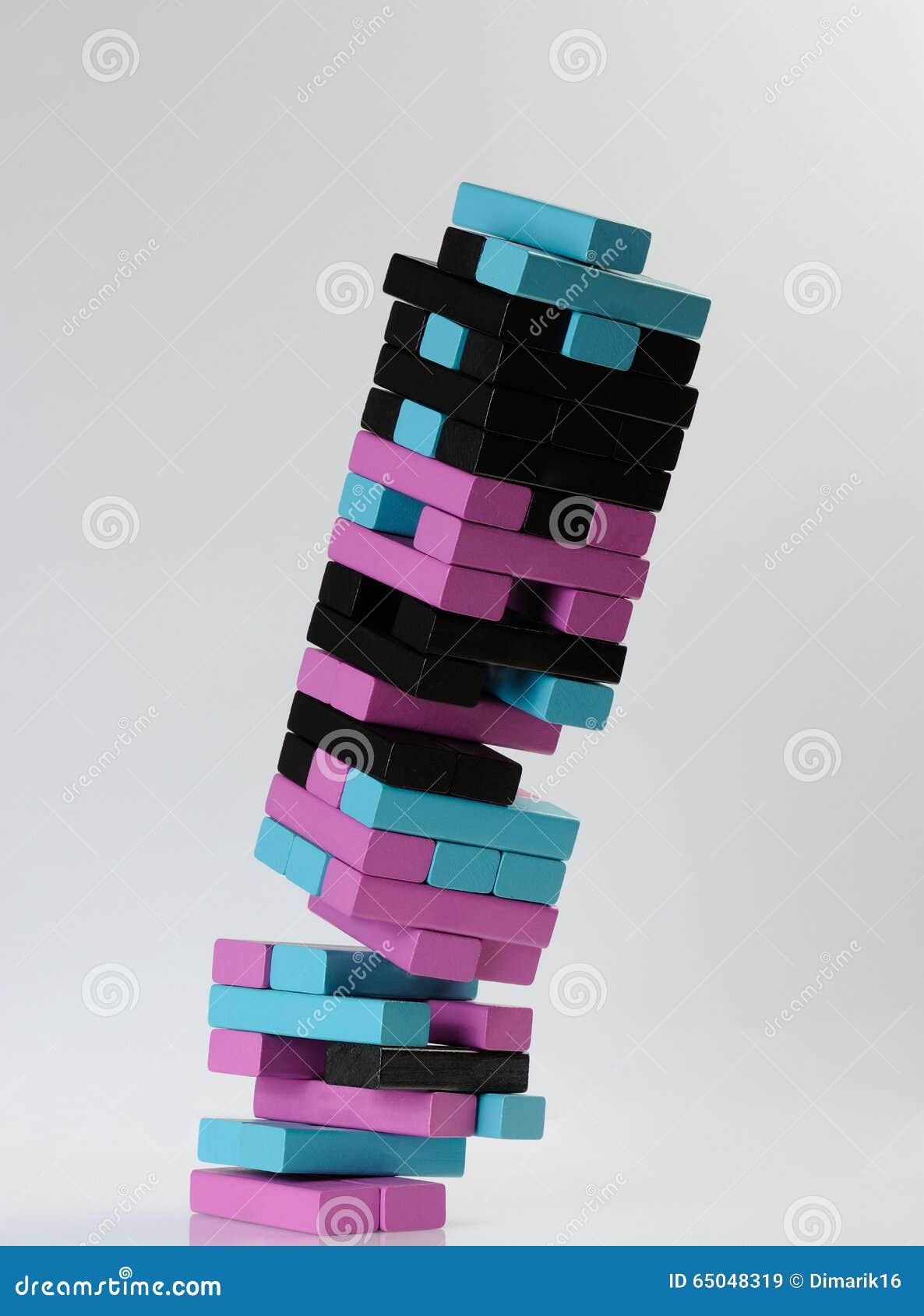 Falling jenga tower stock image. Image of stack, hand - 65048319