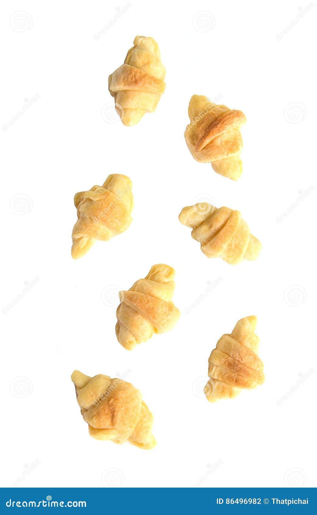 Falling Mini Croissants on White Background Stock Photo - Image of ...
