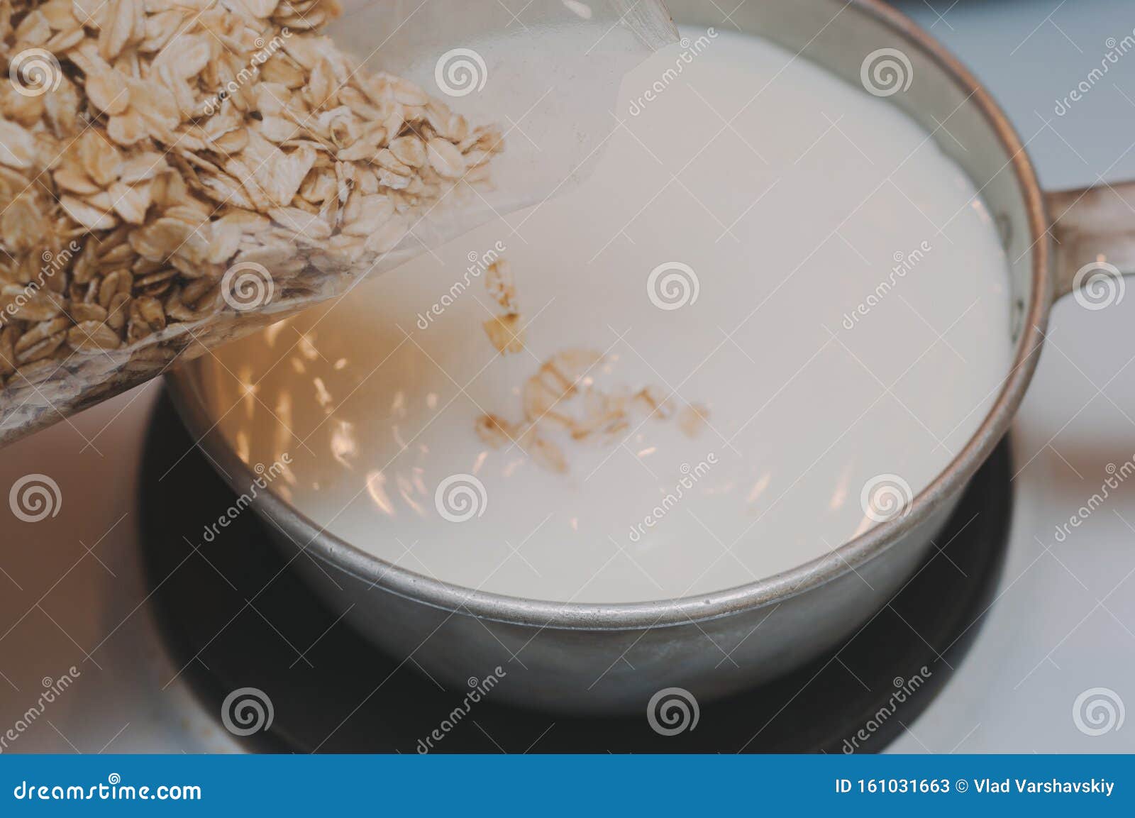 Falling Oatmeal into Hot Milk. Steaming Oatmeal Stock Image - Image of ...
