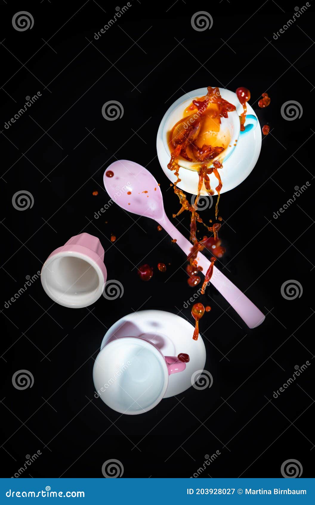 Falling Pink Coffee Mugs and a Spoon, Spilling Coffee with a Splash ...