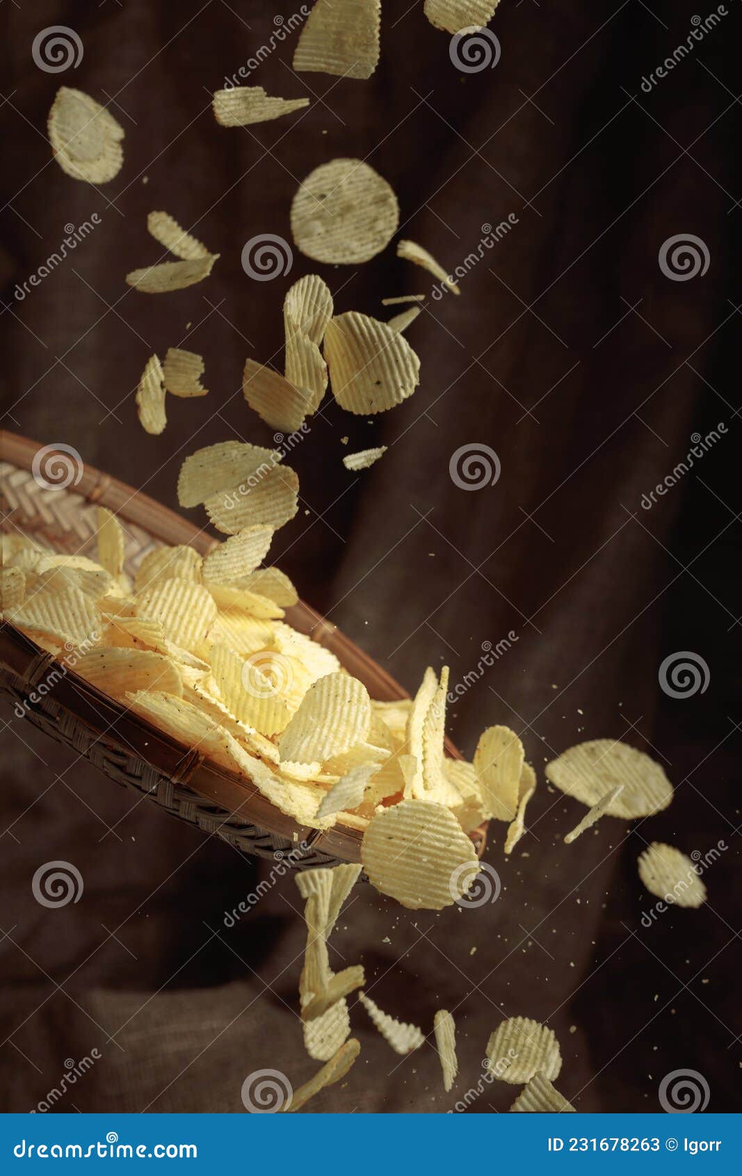 Falling potato chips stock image. Image of burlap, heap - 231678263