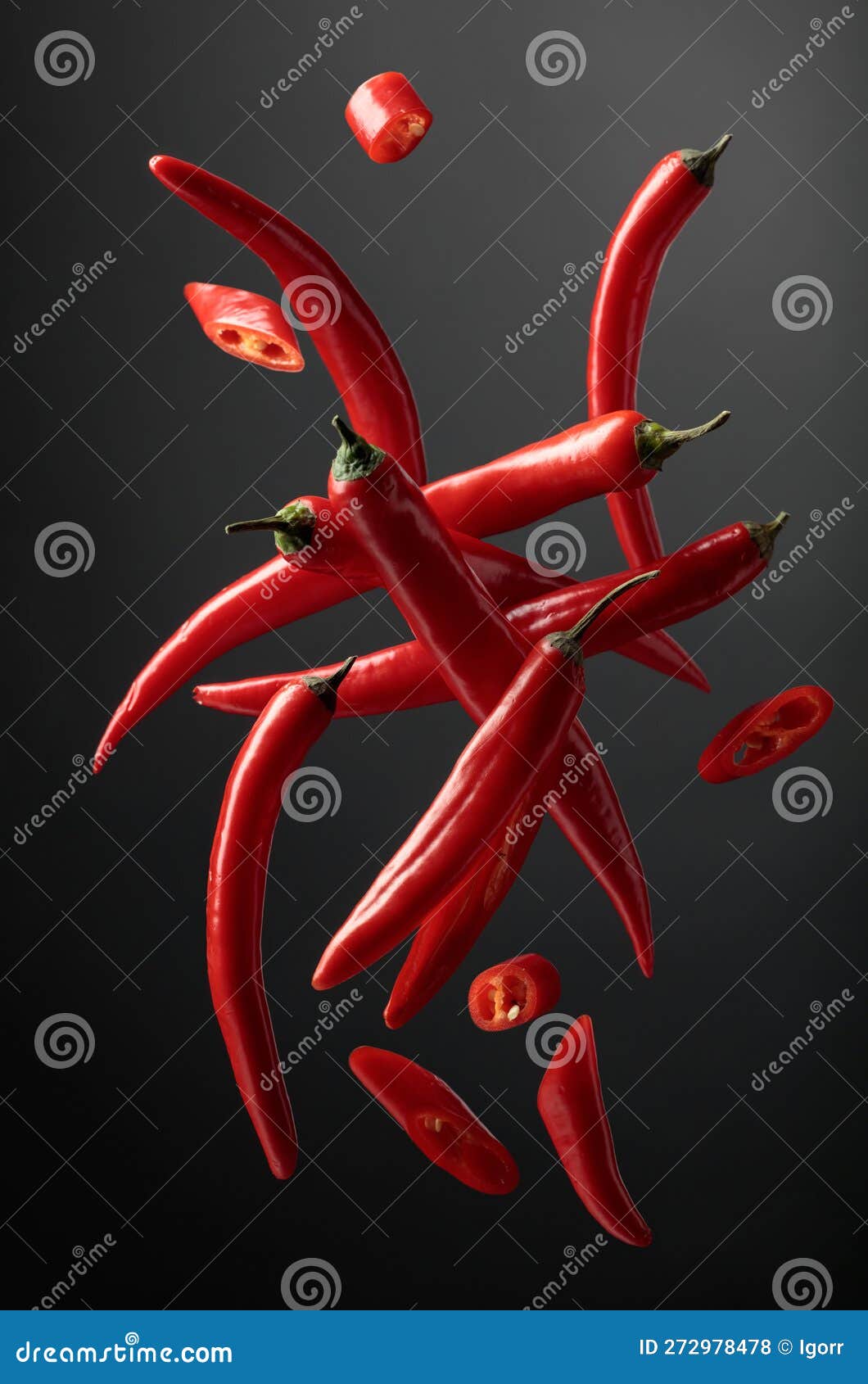 Falling red chili peppers stock photo. Image of cayenne - 272978478