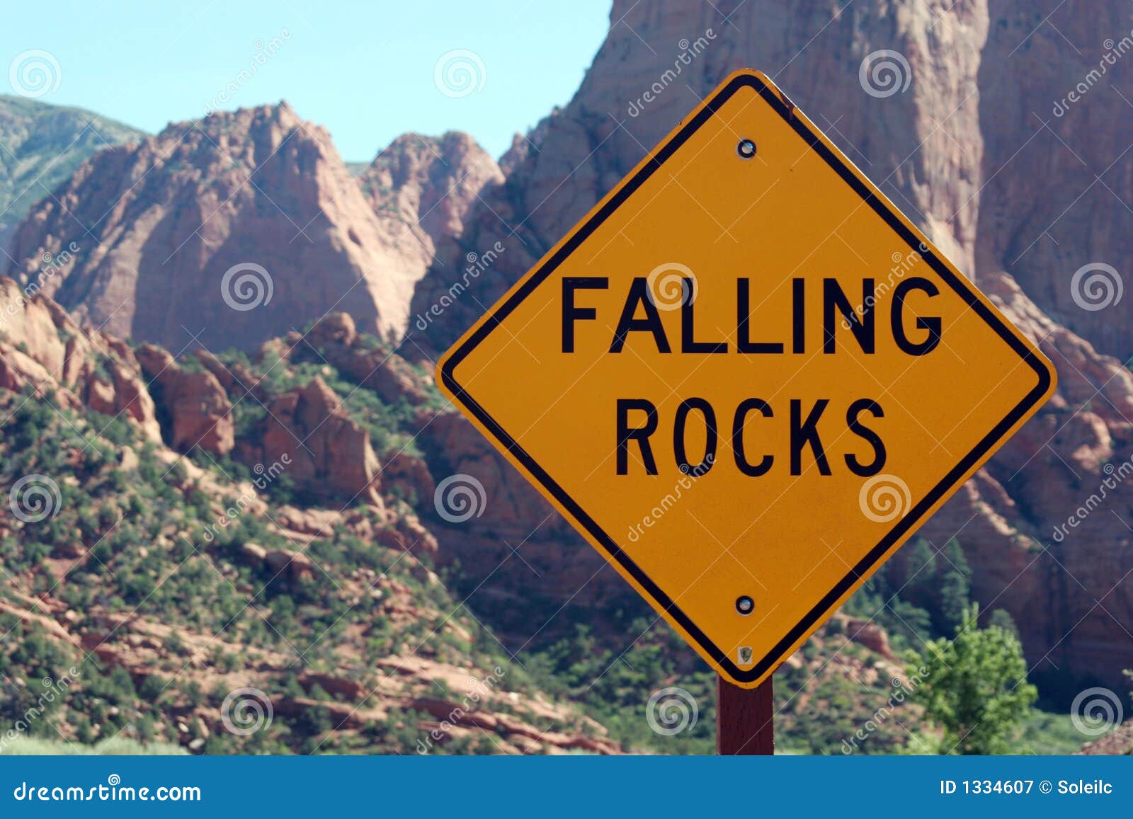 Falling Rocks Ahead Road Sign Stock Image - Image of safety, travel ...