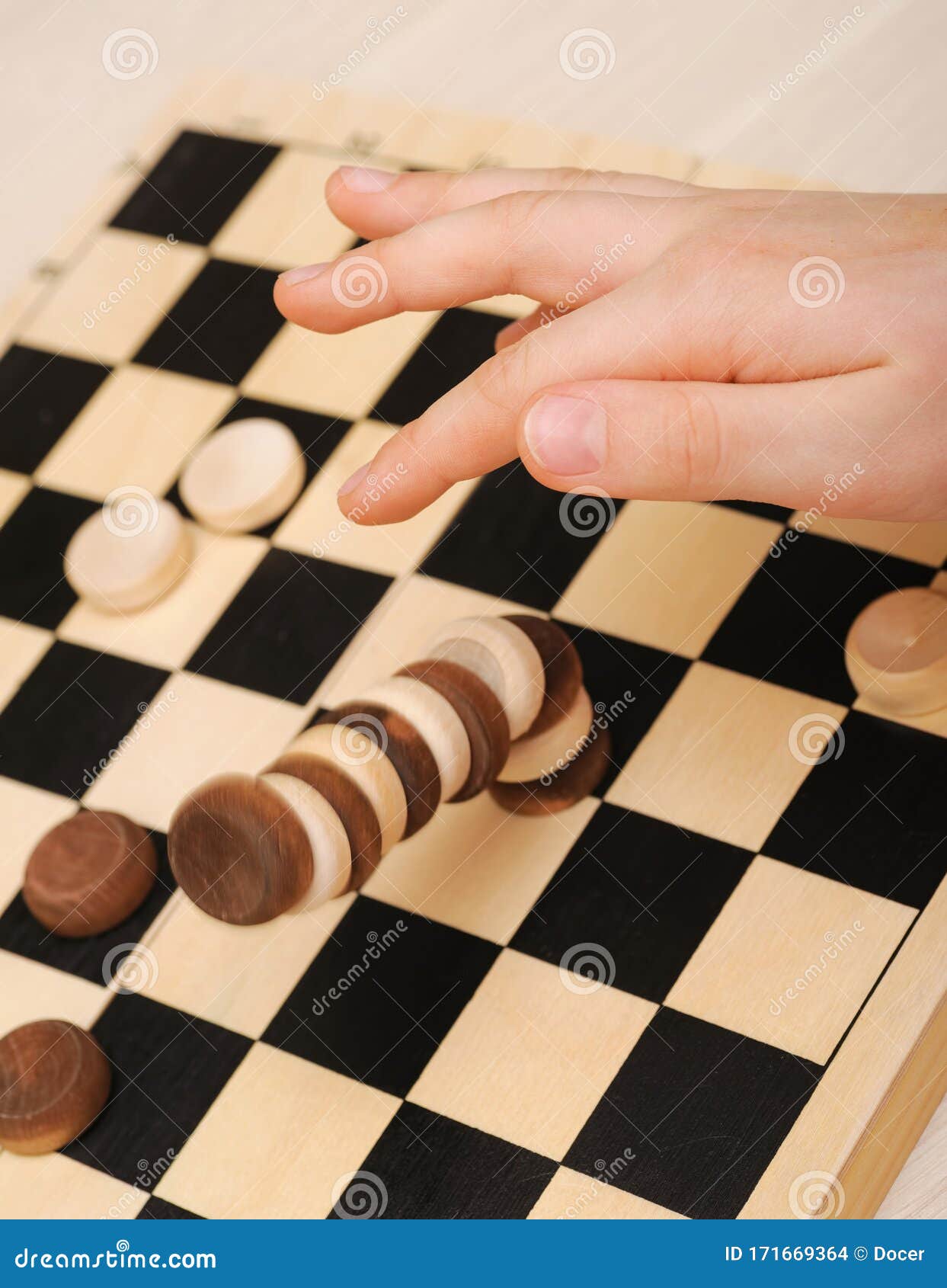 Falling Tower of Drafts on a Chess Field Stock Photo - Image of ...