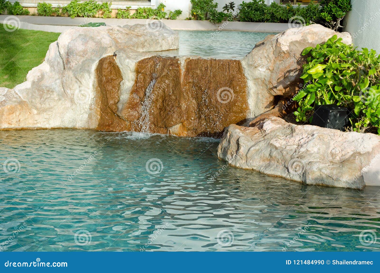 Falling Water on Stones in a Pond Stock Photo - Image of waterfall ...