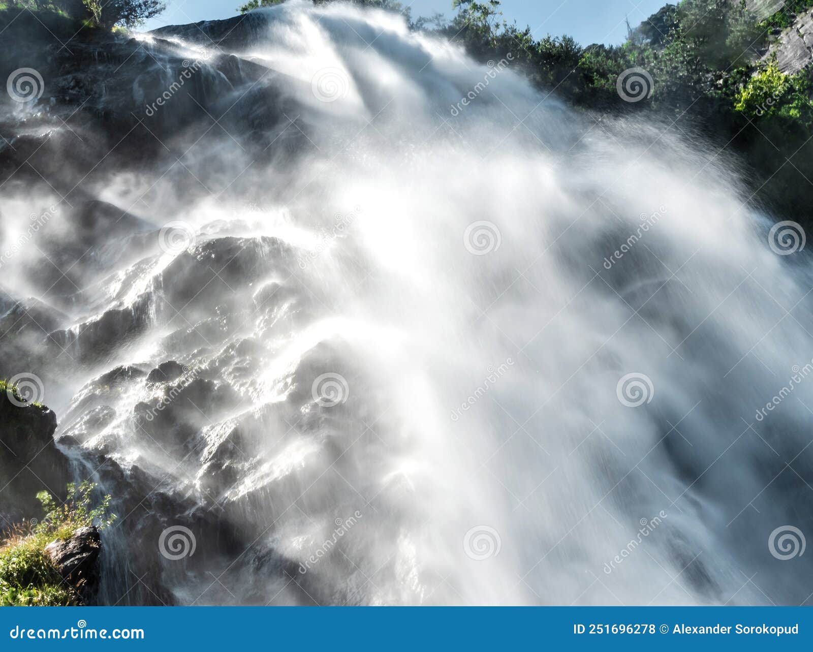 Falling Water in a Waterfall Creates a Cloud of Water Dust Stock Photo ...