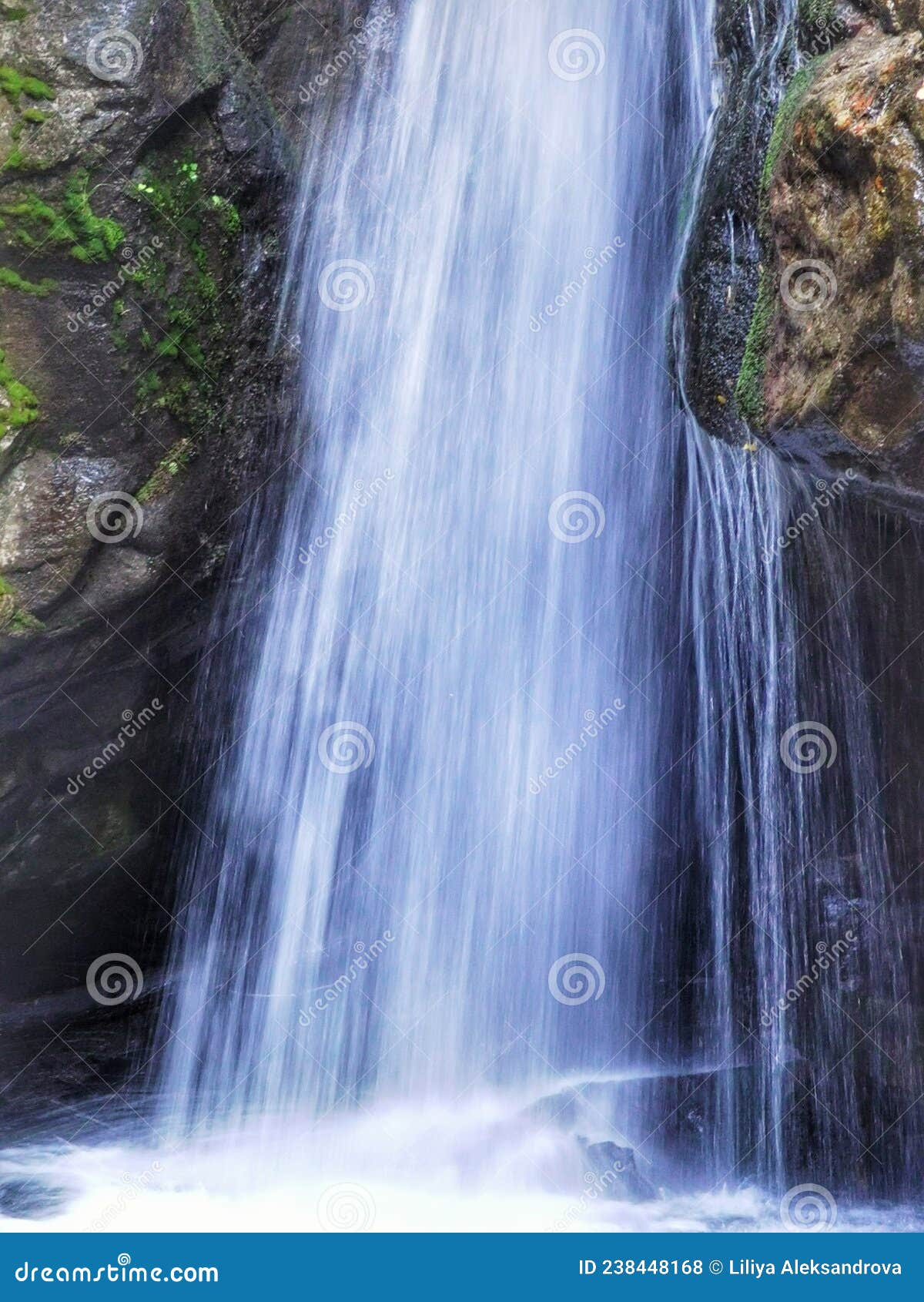 Falling Water from the Waterfall with Rocks Around Stock Photo - Image ...