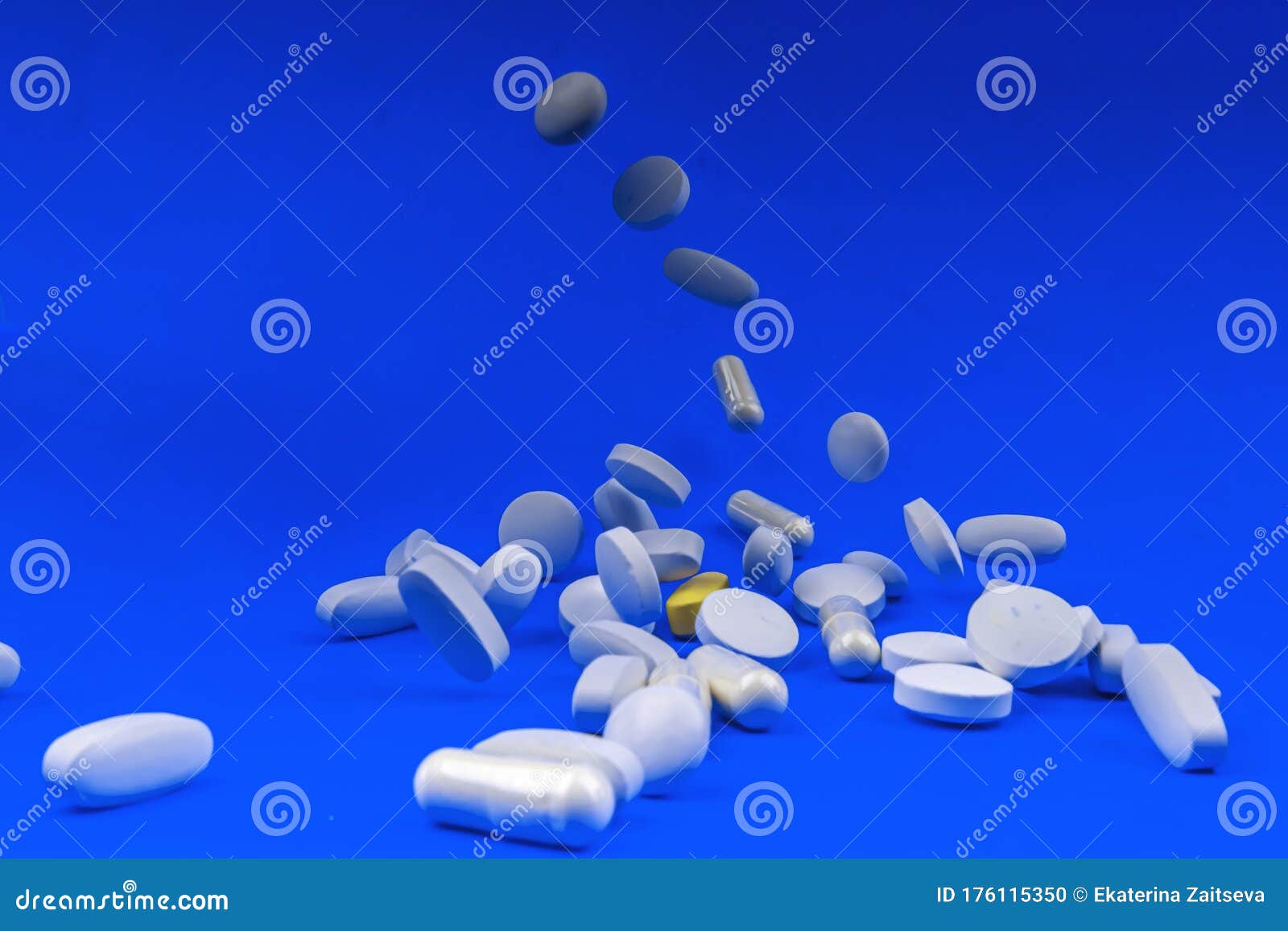 Falling White Pills, Tablets Capsule on Blue Backround. Anti Gravity ...