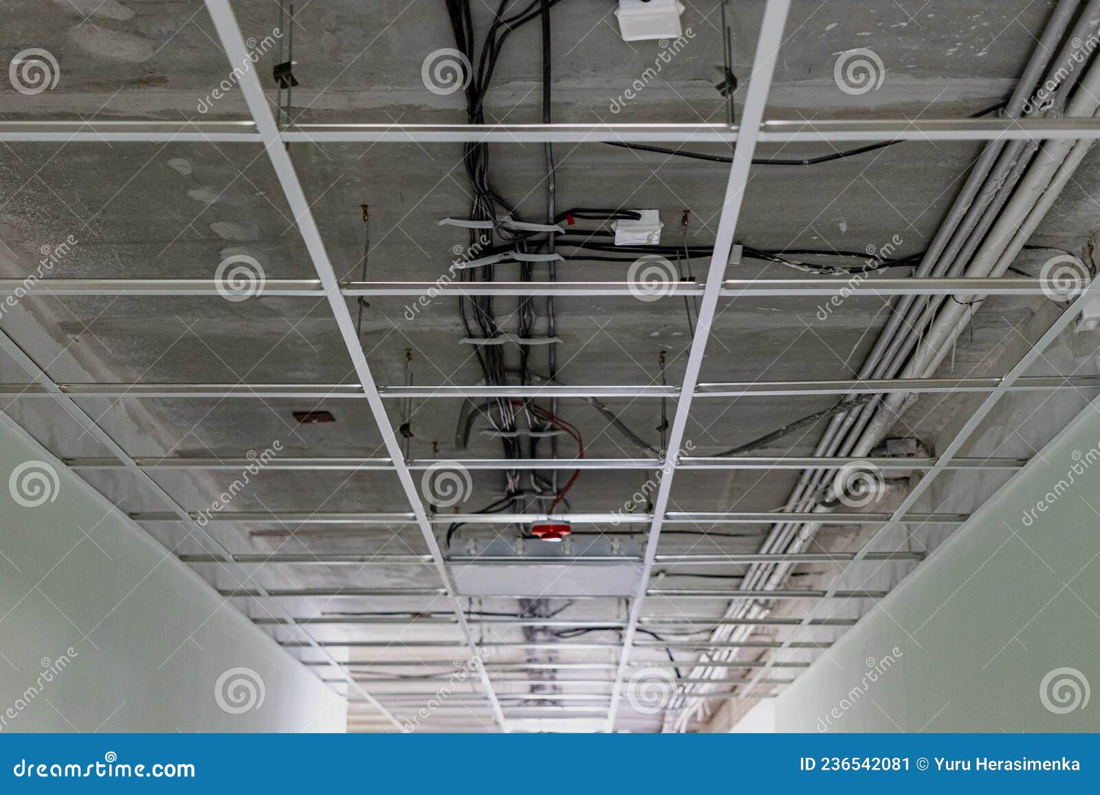 False Ceiling Installation in a Modern Office Building. Communications ...