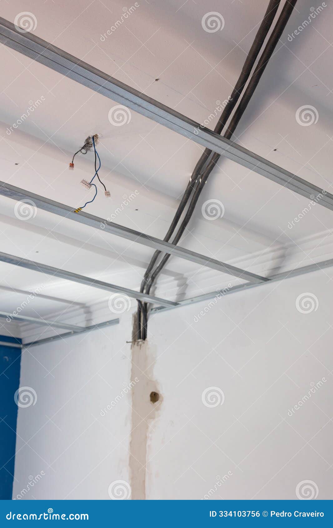 False Ceiling Installation in Progress with Metal Framing and Visible ...