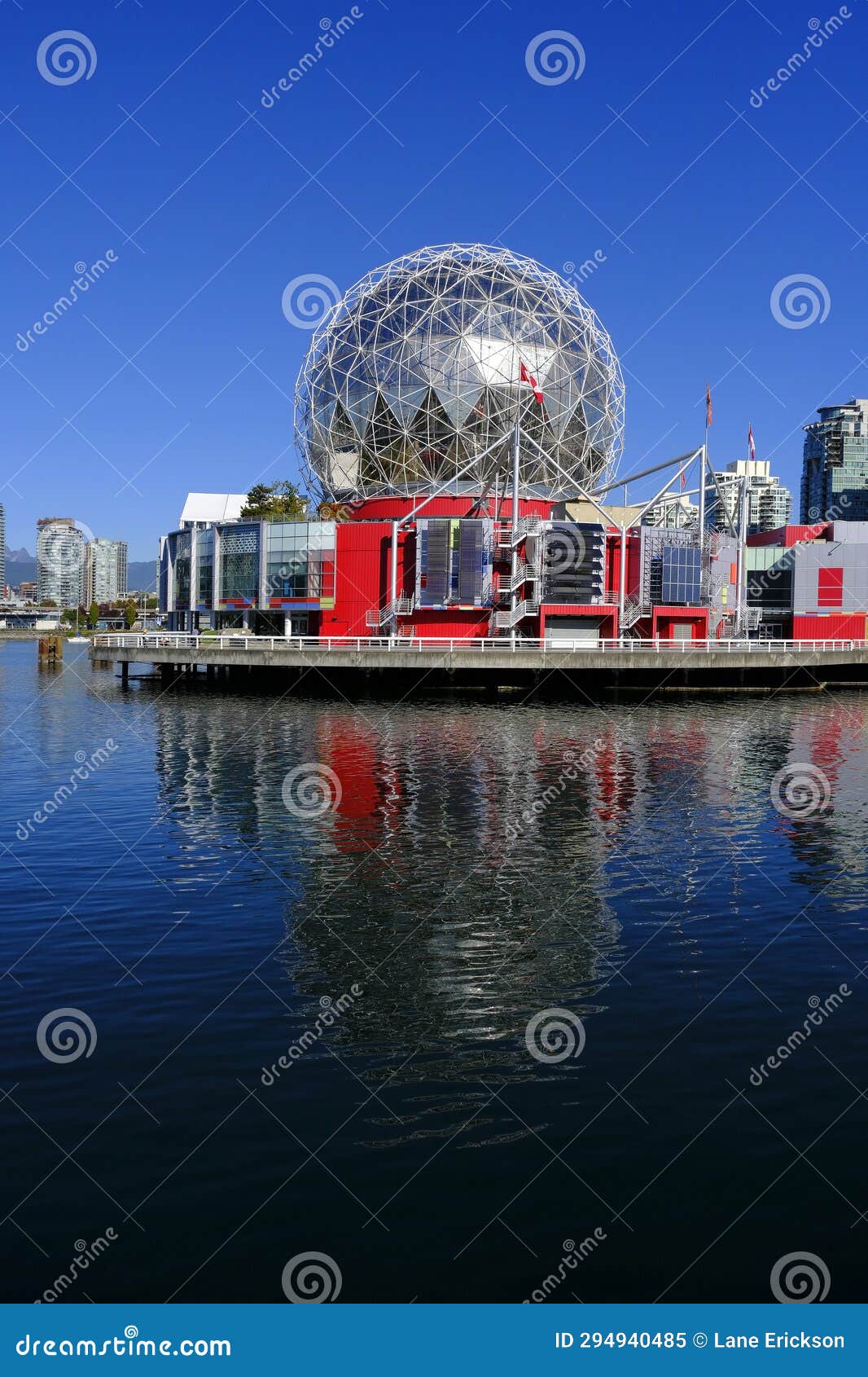False Creek Science Center Building on Sunny Day Reflection in Water ...