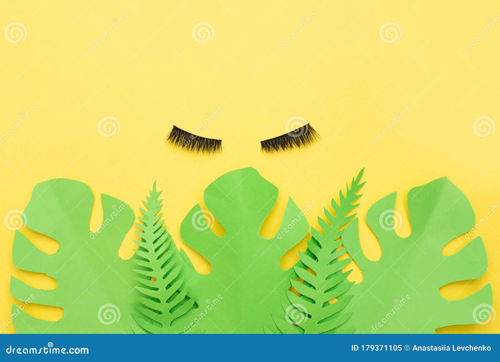 False Eyelashes on Summer Yellow Background with Paper Palm Leaves with ...