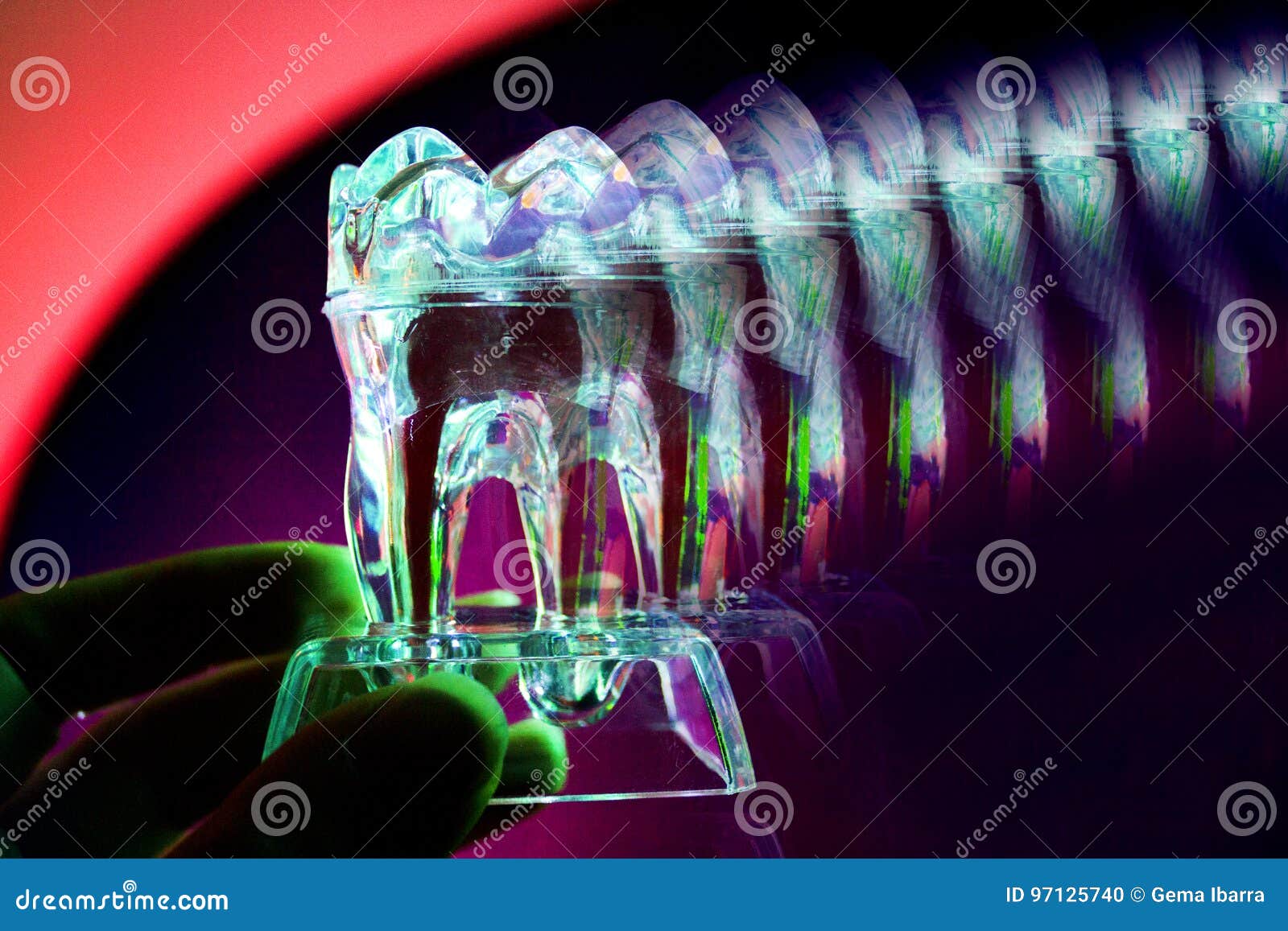 One False Plastic Tooth. Dental Prosthetics On A Background. Dentures ...
