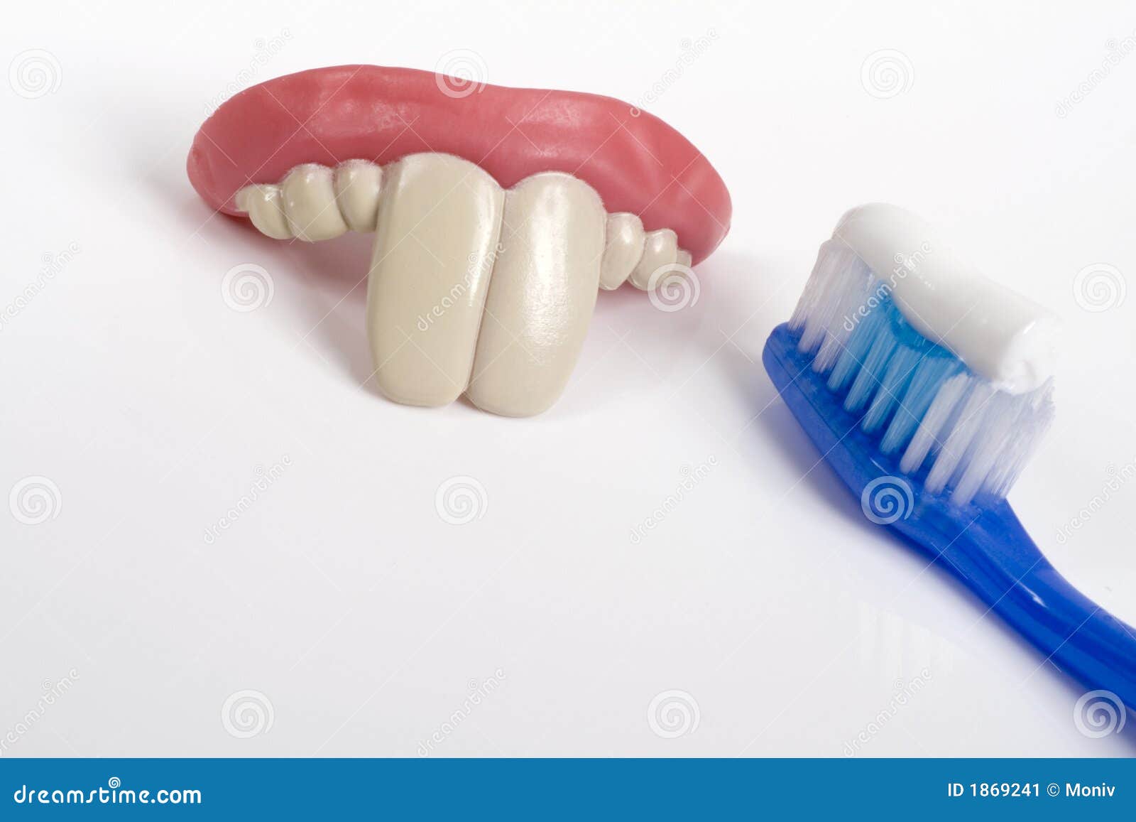 False teeth and toothbrush stock image. Image of brushing - 1869241