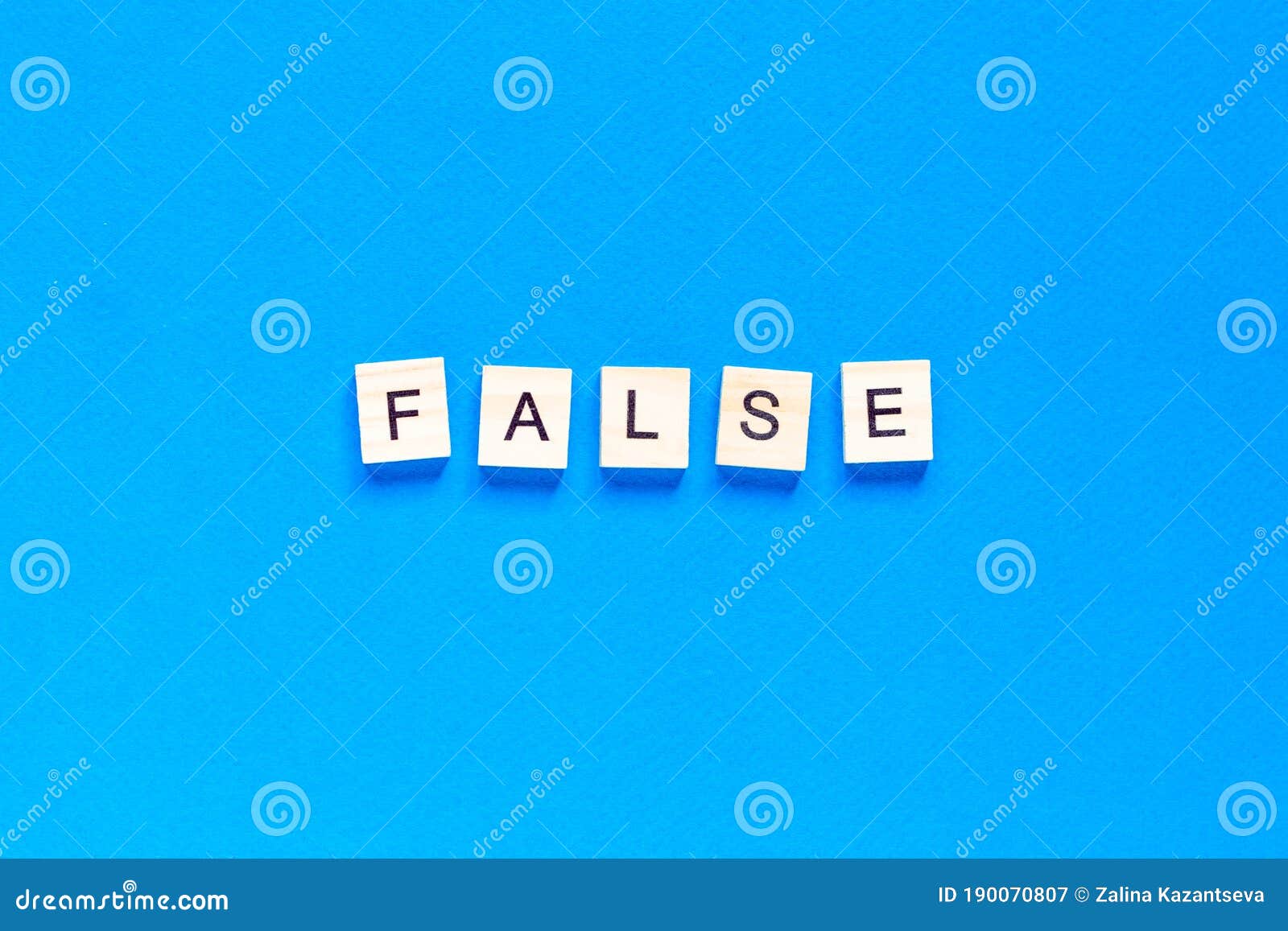 FALSE Word Alphabet Letters On Blue Background. Top View. Flat Layout ...