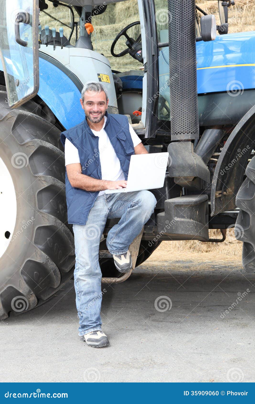 Famer stood by tractor stock photo. Image of connection - 35909060