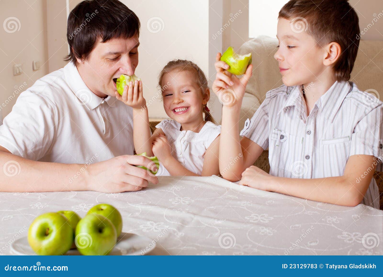 Family with apples stock image. Image of portrait, breakfast - 23129783