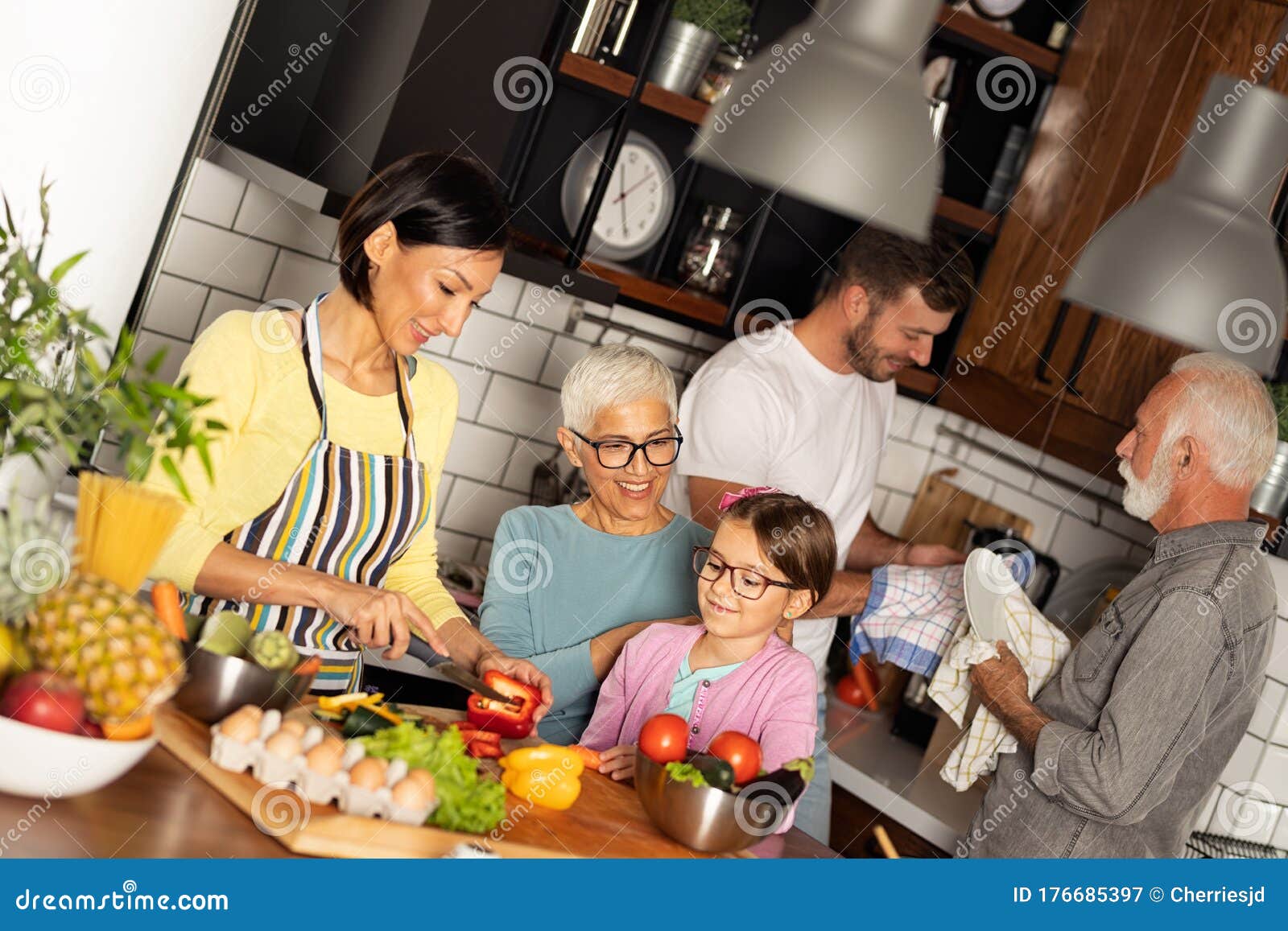 Family Around Kitchen Table Stock Image - Image of cheerful, grandchild ...