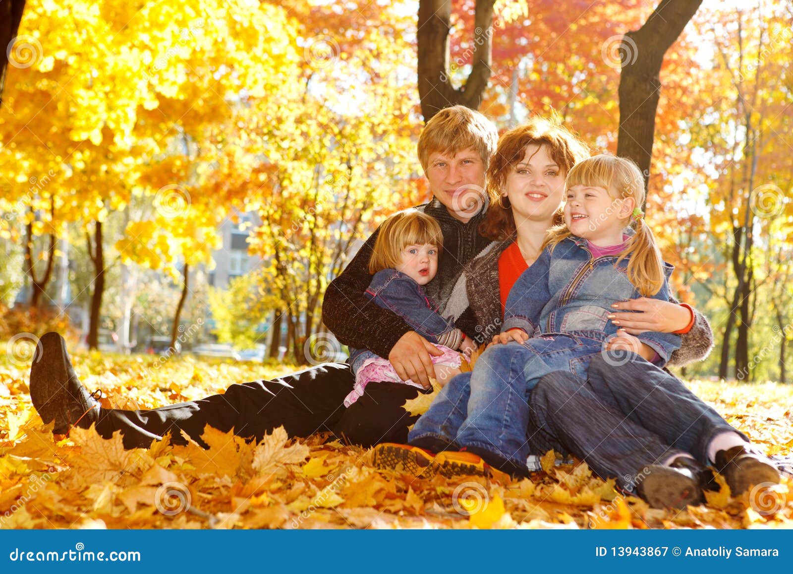 Family on autumn leaves stock image. Image of girl, outside - 13943867