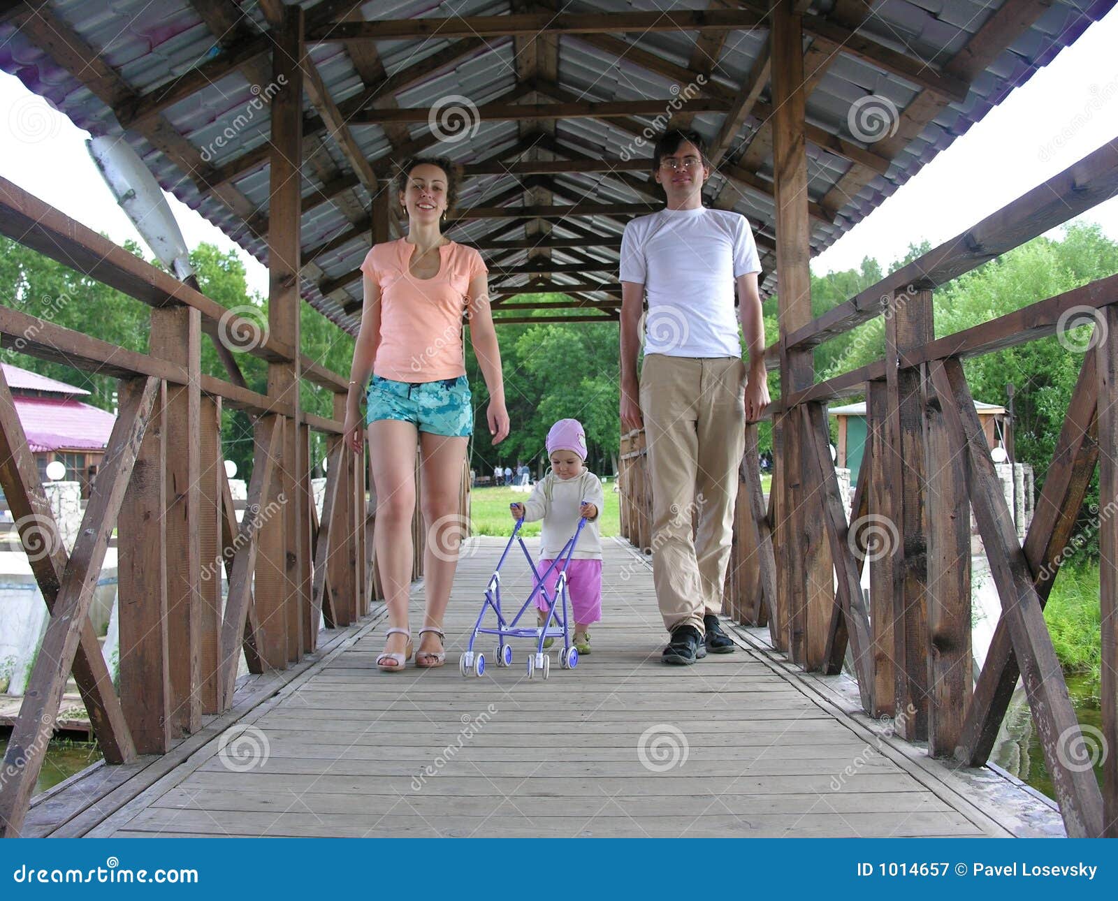 Family with baby on bridge stock image. Image of bridge - 1014657