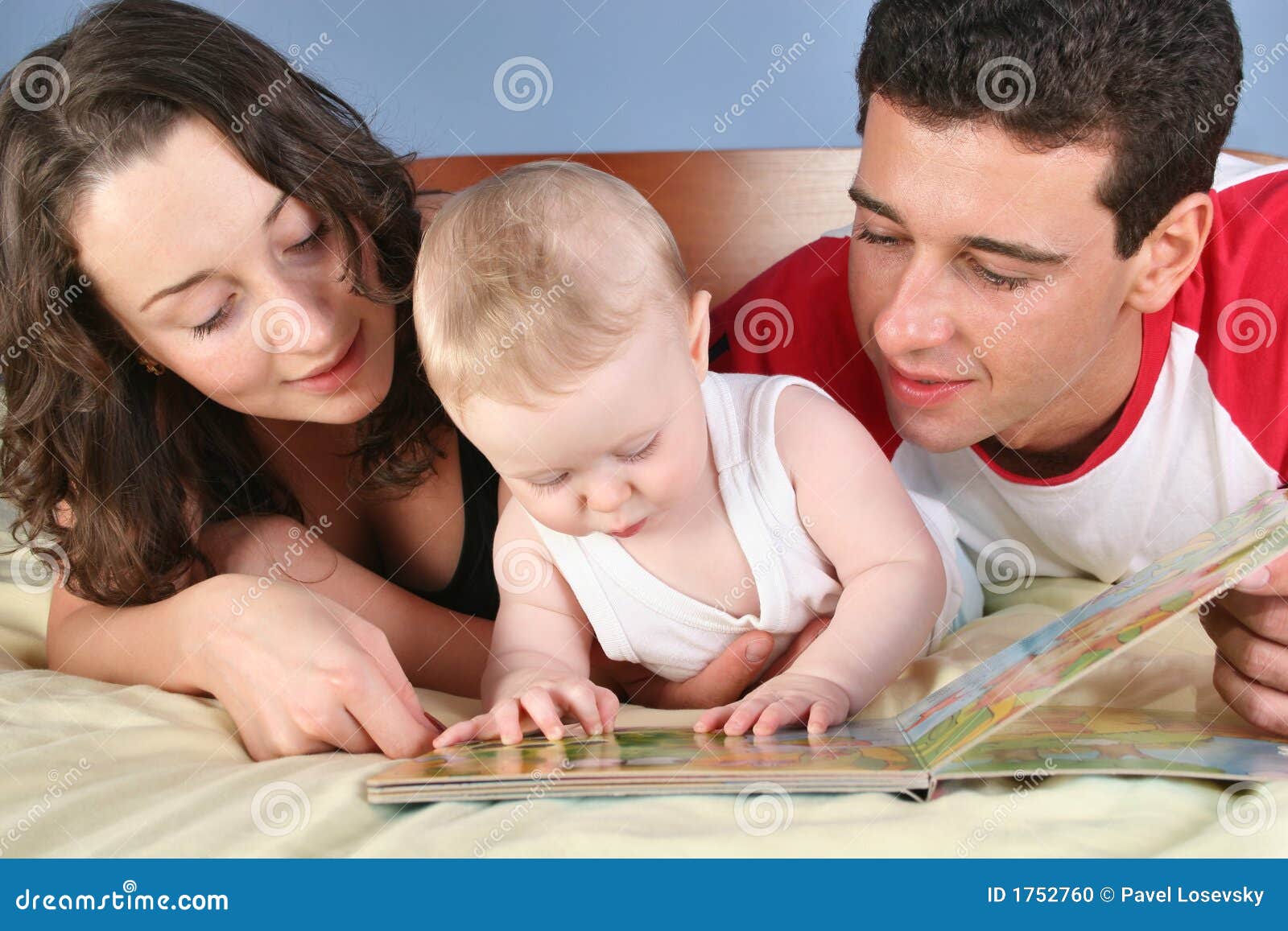 Family with Baby Read Book 2 Stock Photo - Image of male, book: 1752760