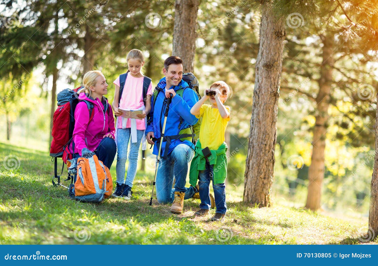 Family with Backpacks Hiking Stock Image - Image of compass, adventure ...