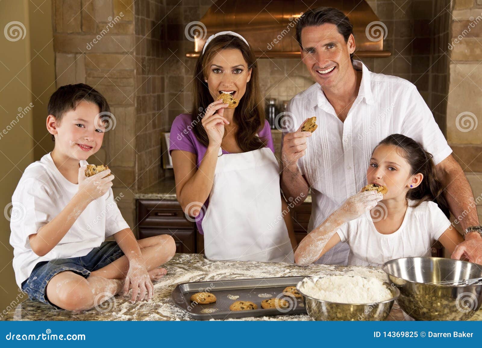 Family Baking and Eating Cookies in a Kitchen Stock Image - Image of ...