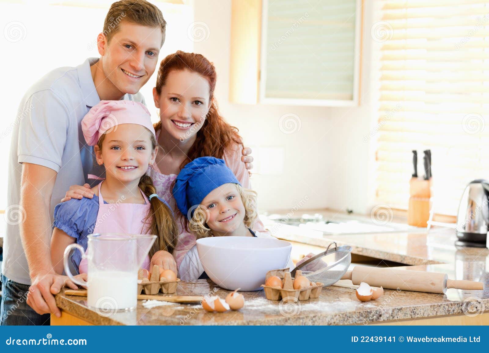 Family with Baking Ingredients Behind the Kitchen Counter Stock Image ...