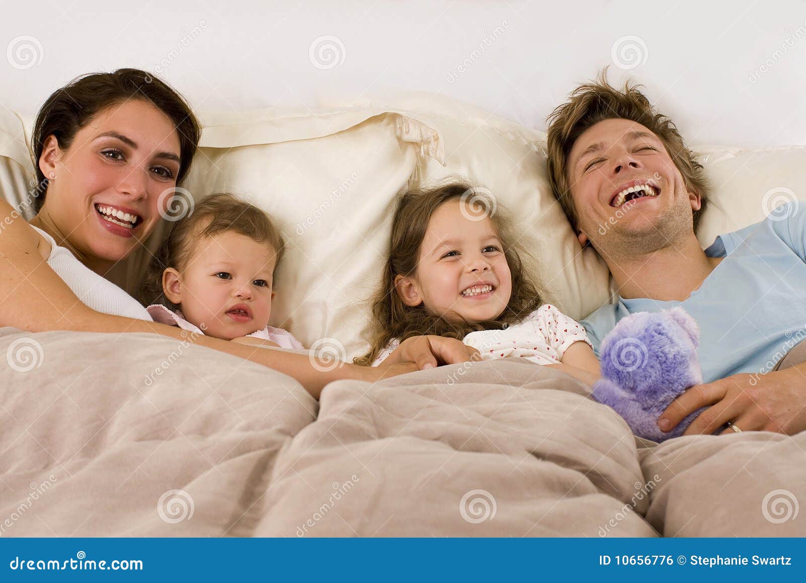 Family bed stock photo. Image of kids, people, morning - 10656776