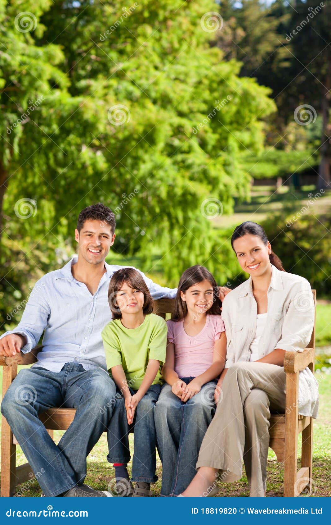 Family on the bench stock photo. Image of leisure, handsome - 18819820