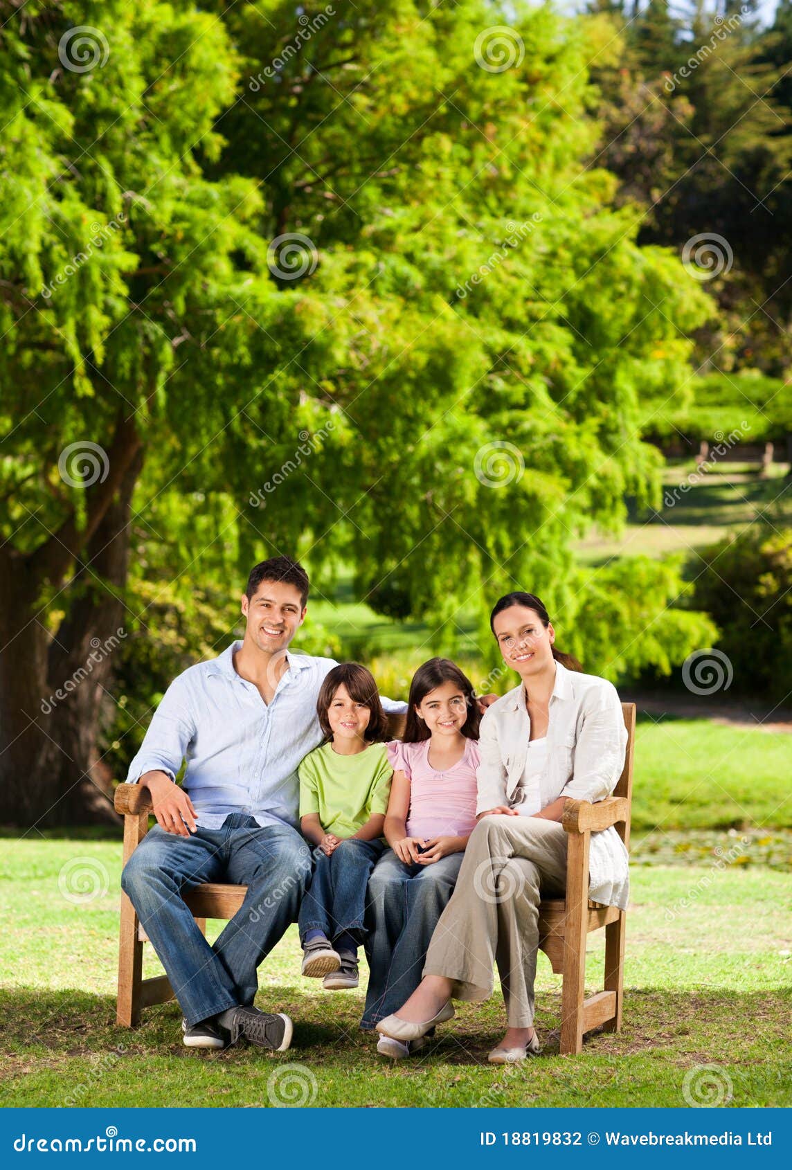 Family on the bench stock photo. Image of garden, daughter - 18819832