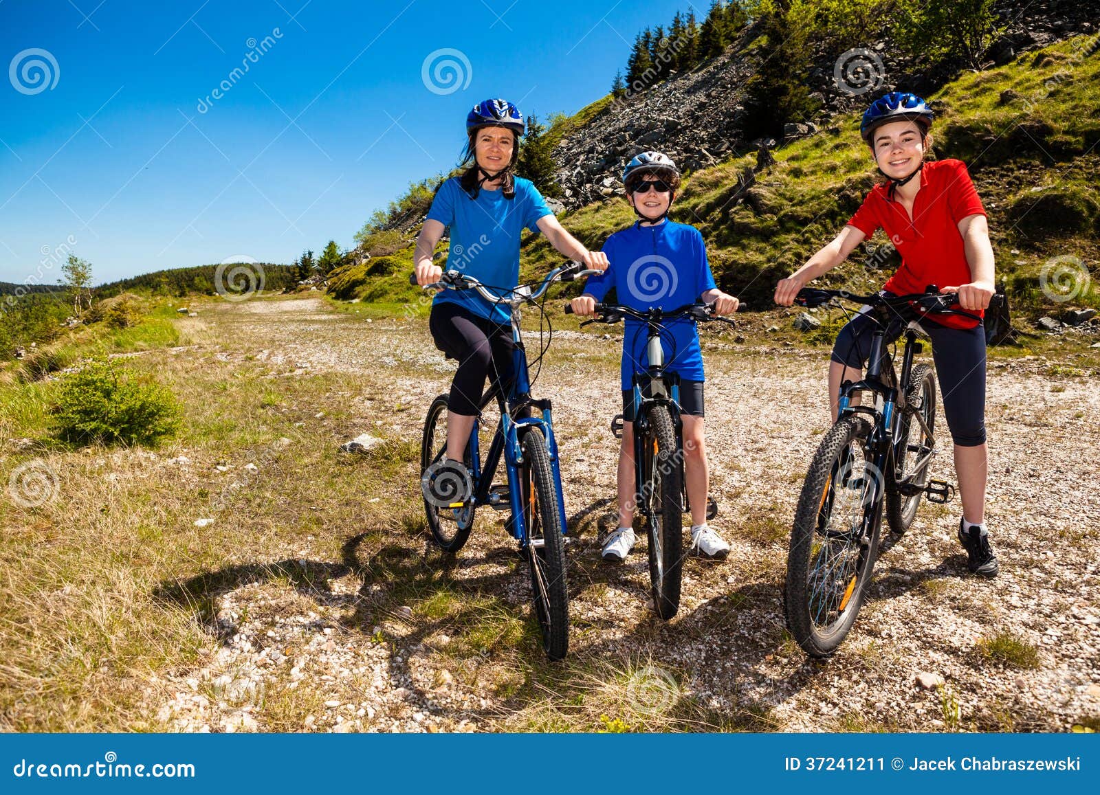 Family biking stock image. Image of bikers, helmet, female - 37241211