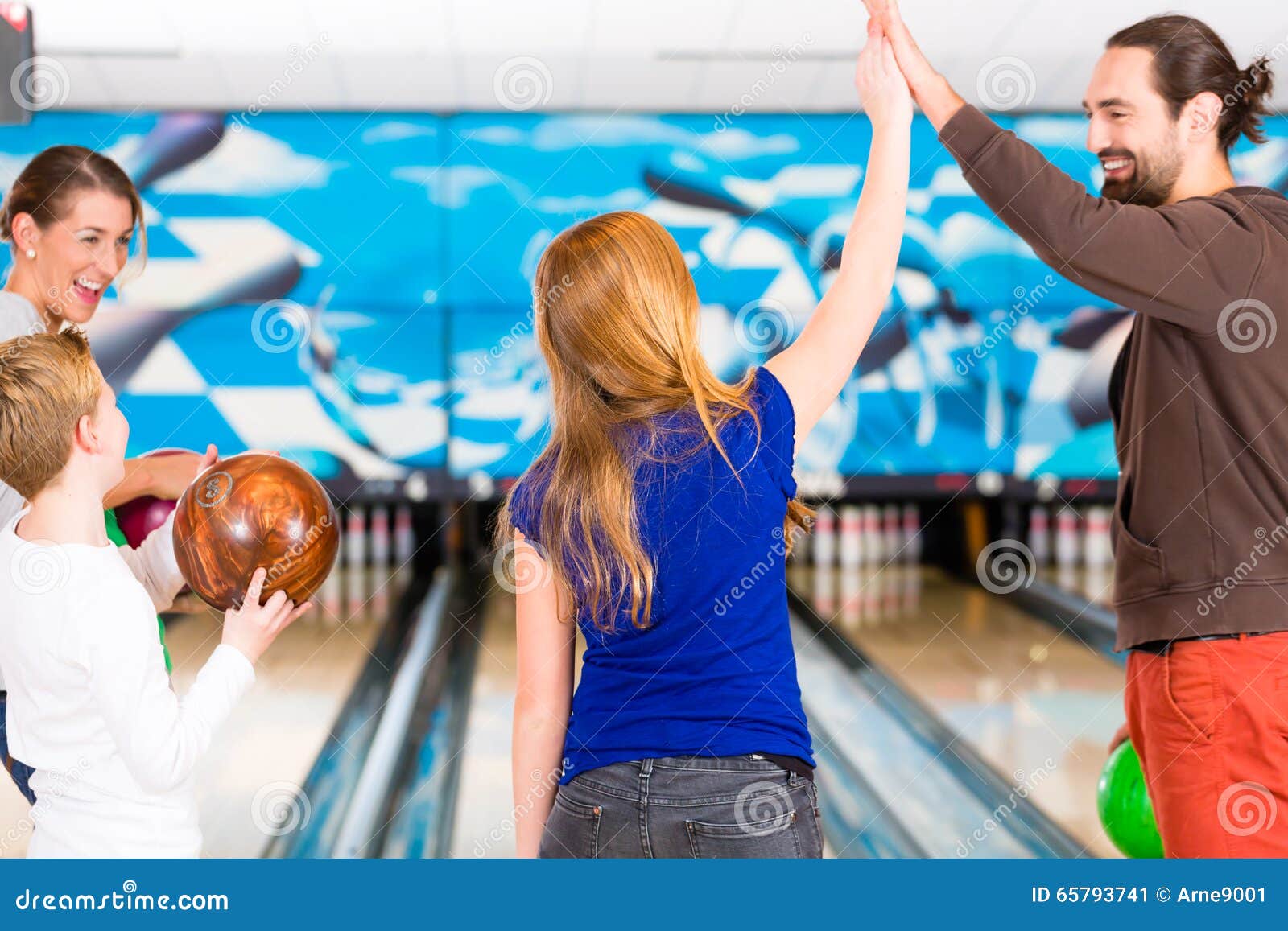 Family at Bowling Center stock image. Image of health - 65793741
