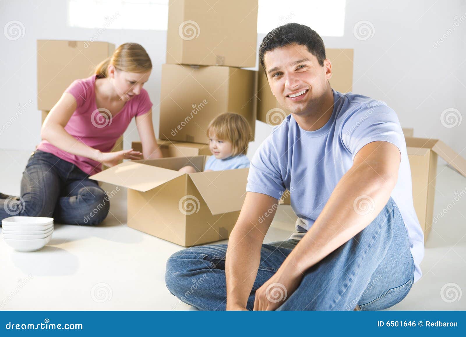 Family between boxes stock photo. Image of motherhood - 6501646