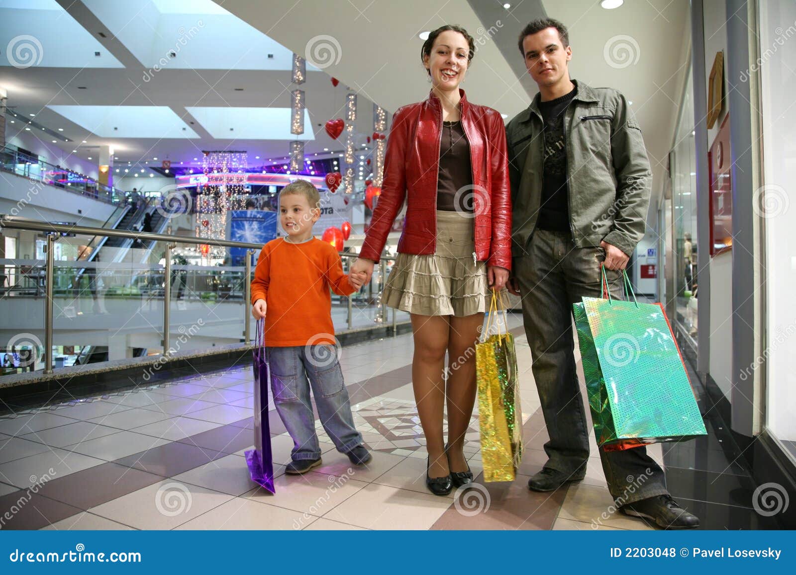 Family with boy in shop stock photo. Image of female, hypermarket - 2203048