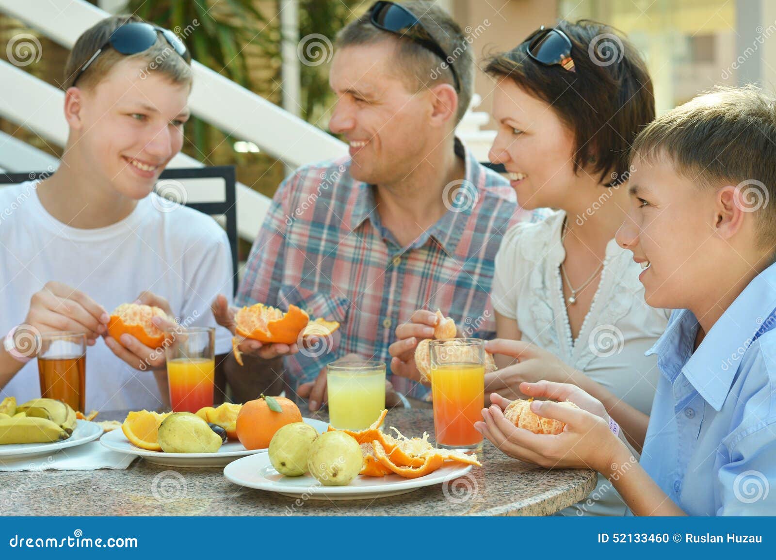 Family at breakfast stock photo. Image of cafe, beautiful - 52133460