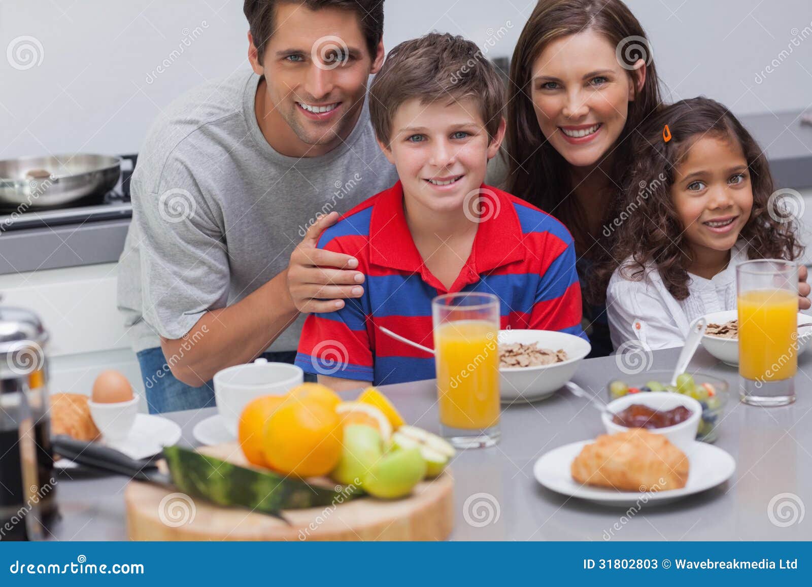 Family during the Breakfast Stock Image - Image of cute, chopping: 31802803
