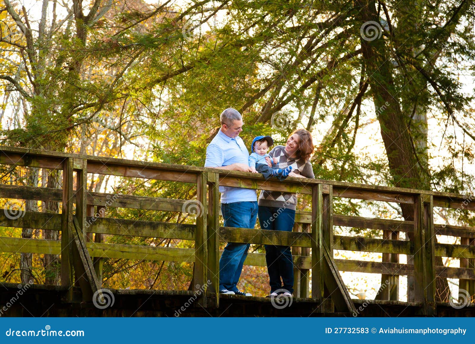 Family on a Bridge stock image. Image of bridge, creek - 27732583