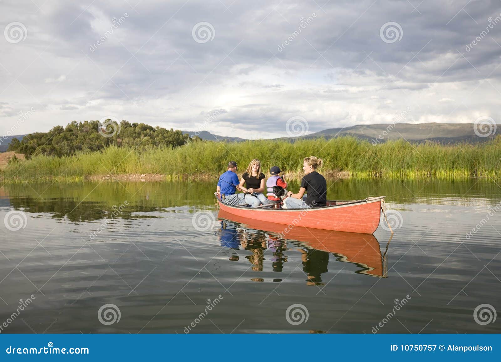 Family and canoe stock image. Image of border, pond, father - 10750757