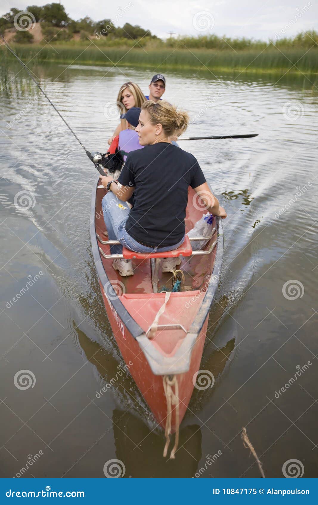Family in Canoe Straight on Stock Image - Image of water, canoe: 10847175