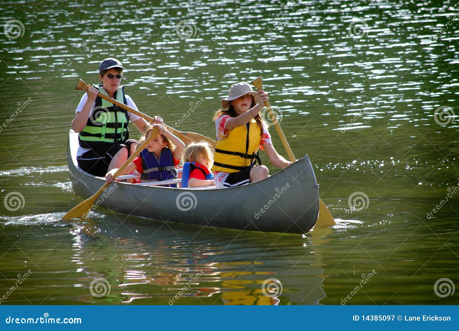 Family Canoeing at Lake stock image. Image of canoe, black - 14385097